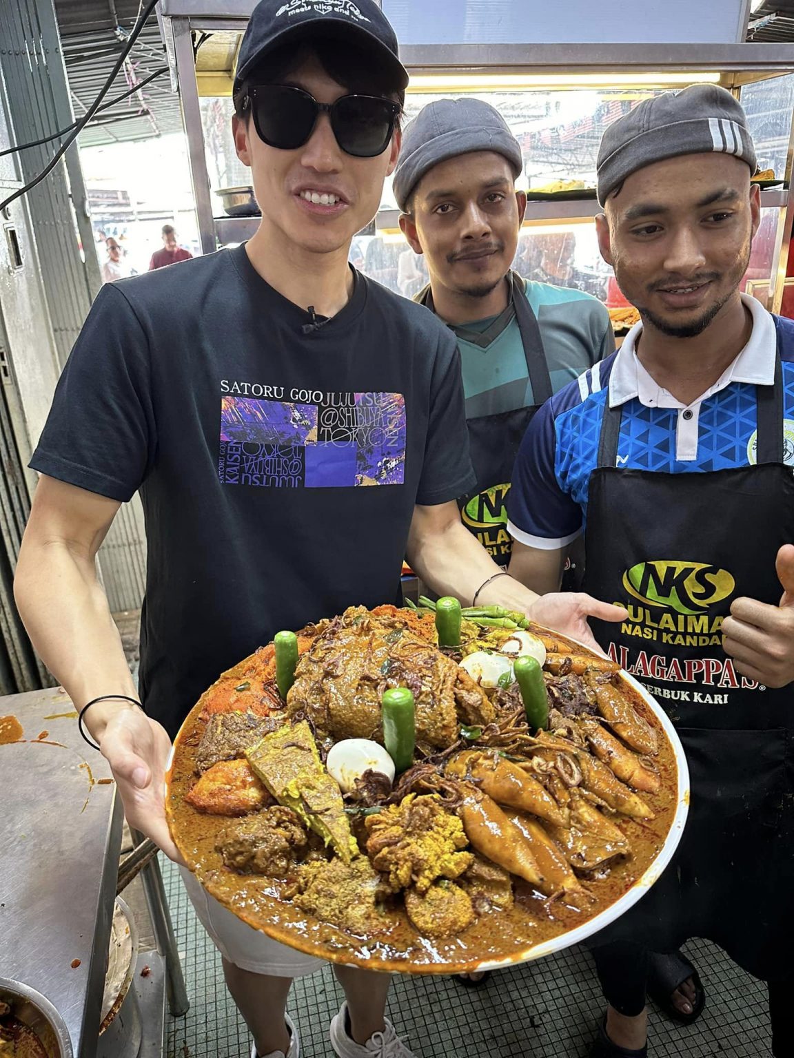 S'porean competitive eater Zermatt Neo finishes RM300 worth of Nasi ...